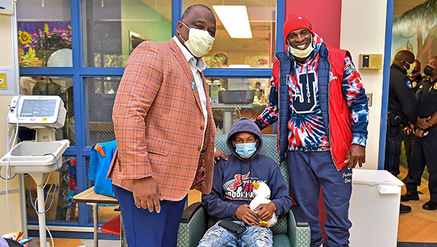 'Coach Prime' flies in with flock of Aflac ducks to surprise Children's ...